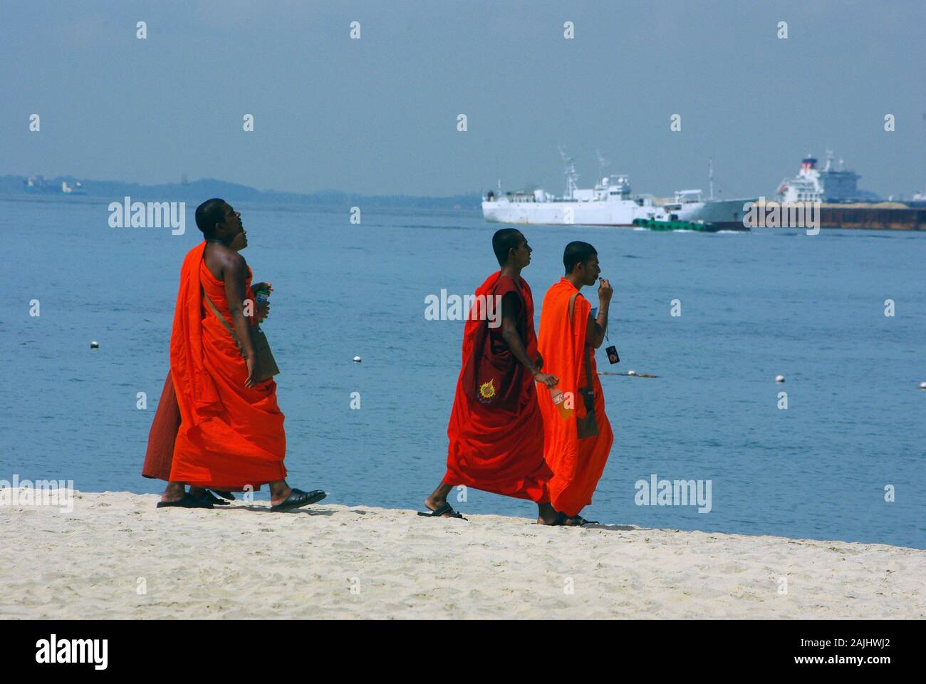 Monks on beach hi-res stock photography and images - Alamy