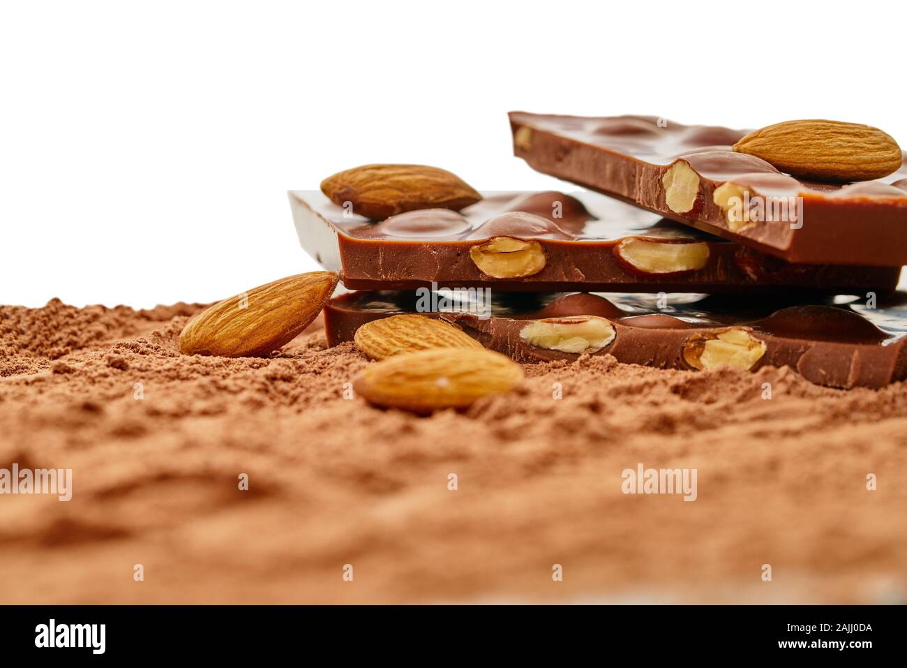 chocolate bar on a background of cocoa powder Stock Photo - Alamy