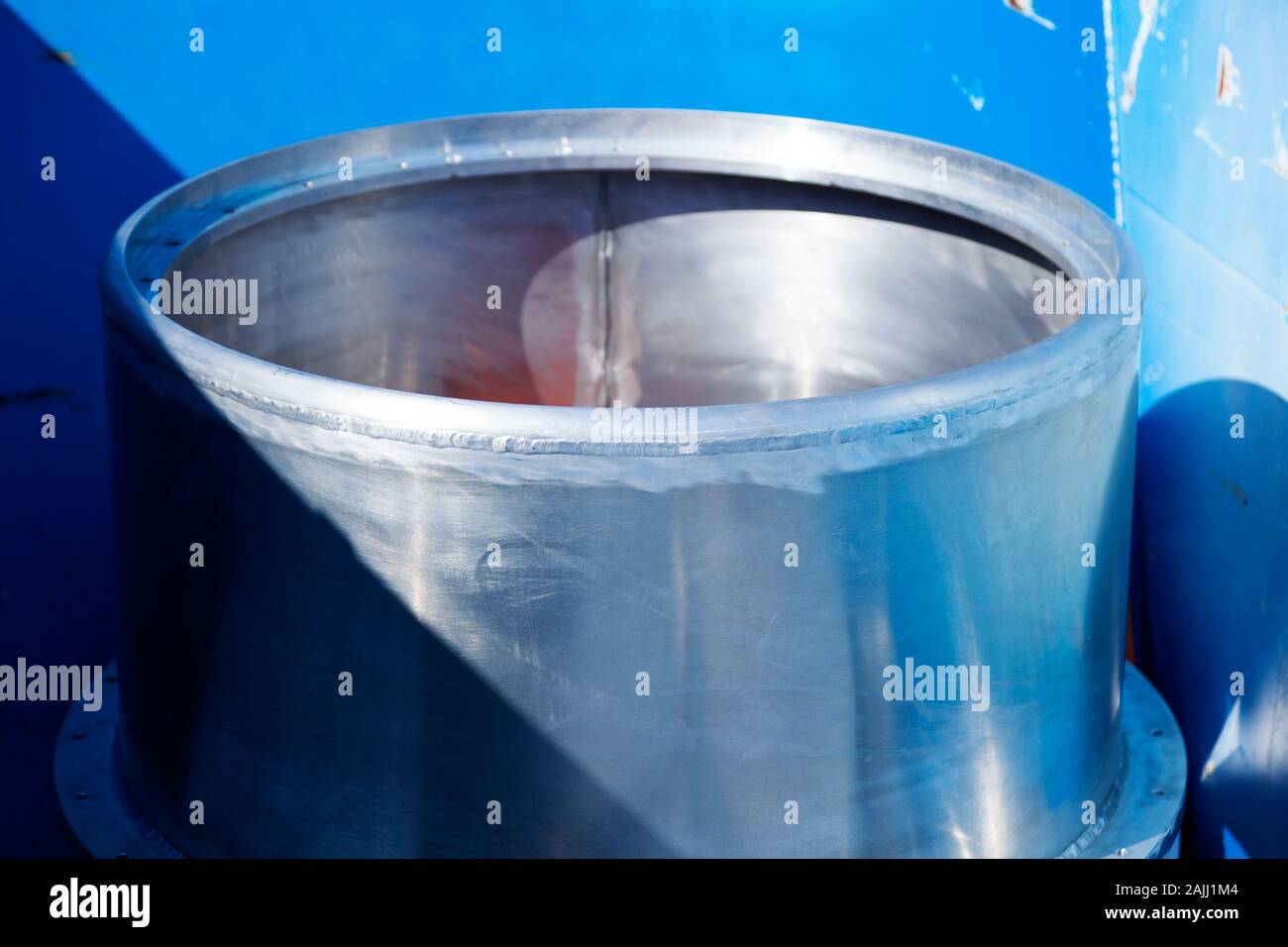 metal cylinder in a blue container Stock Photo - Alamy