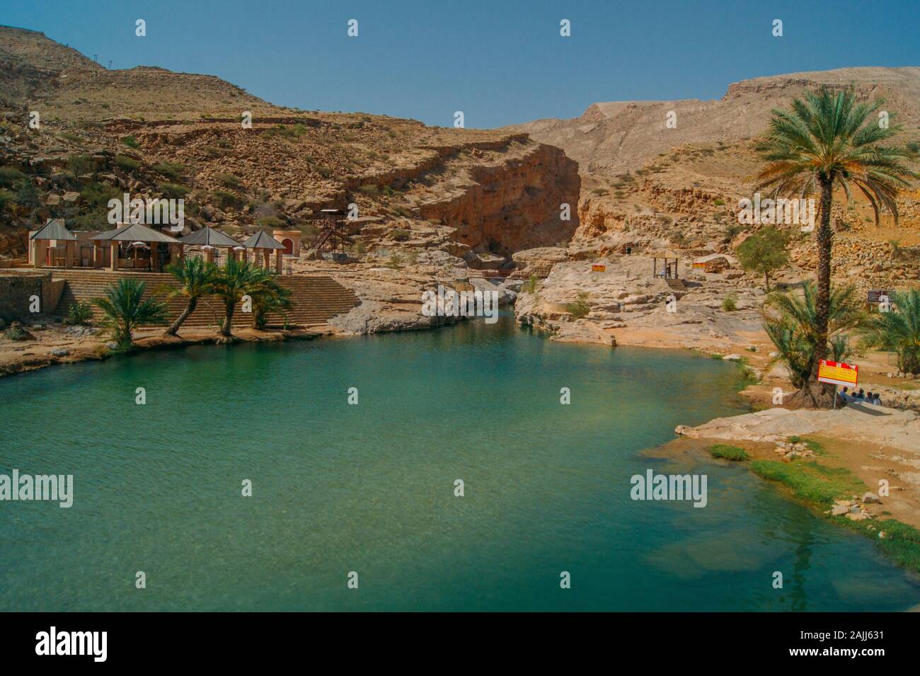 beautiful oasis in Oman with fresh blue water Stock Photo - Alamy