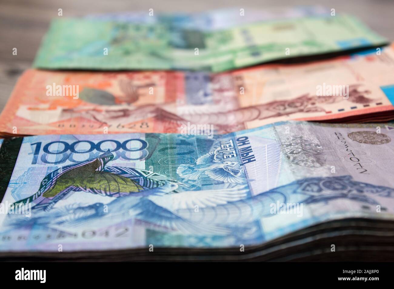 Paper banknotes tenge KZT. Tenge is the national currency of Kazakhstan ...