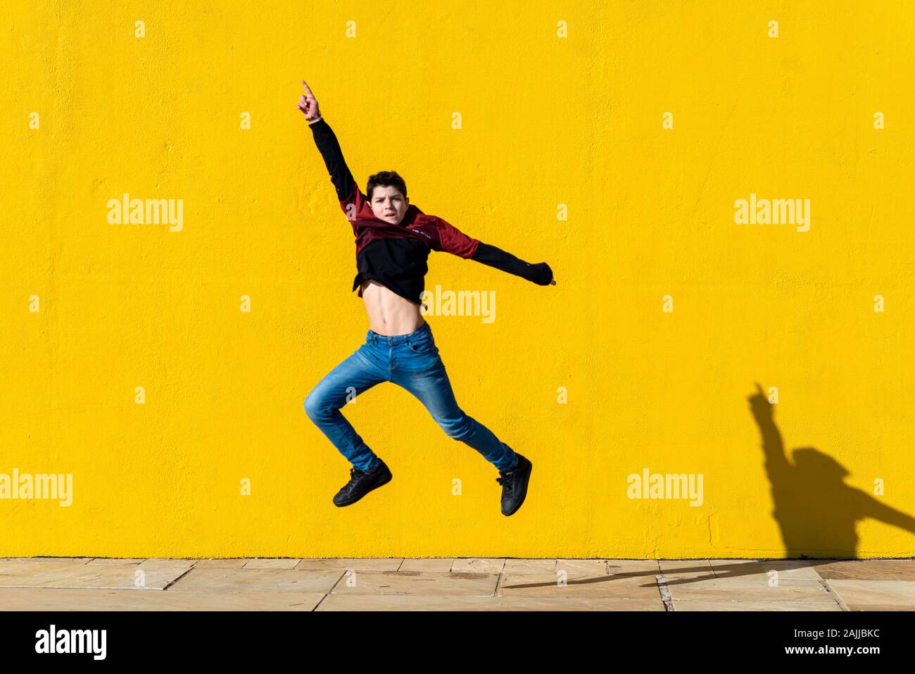 Teenage child isolated jumping hi-res stock photography and images - Alamy