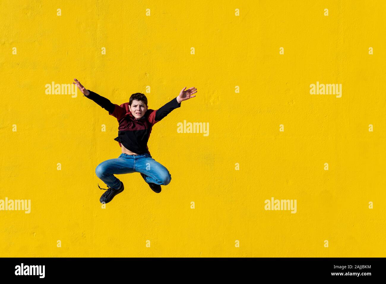 Teenage child isolated jumping hi-res stock photography and images - Alamy