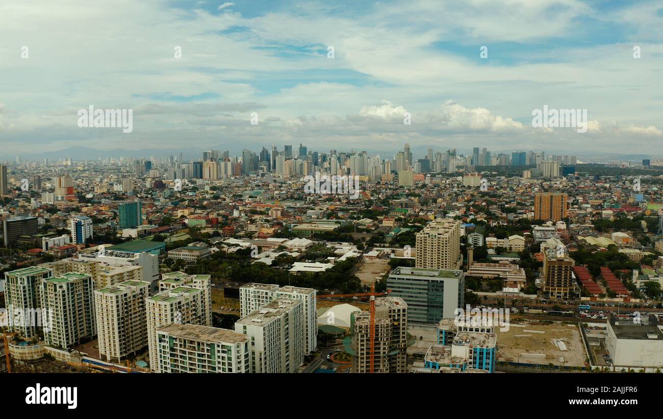 Aerial view of Panorama of Manila with skyscrapers and business centers ...