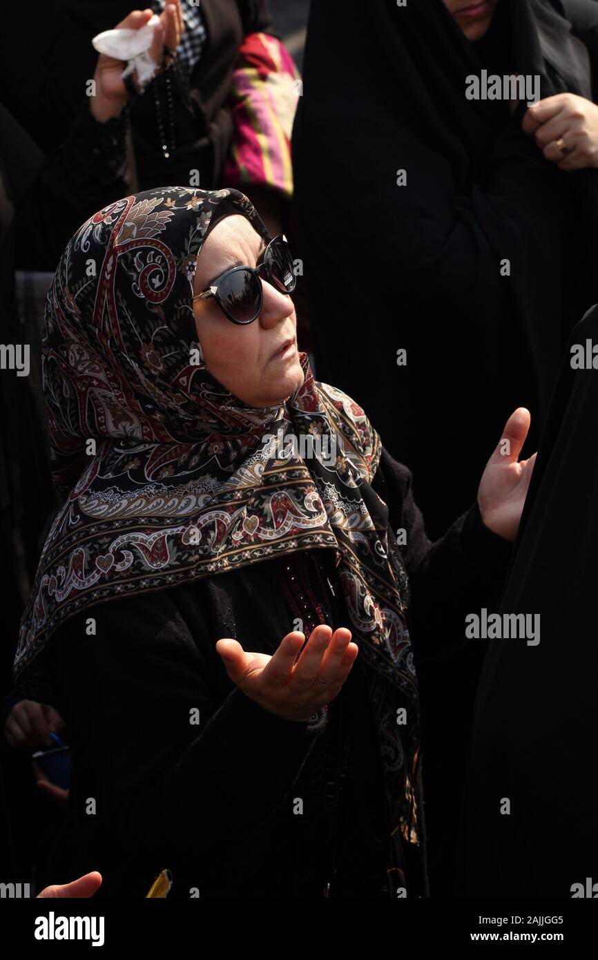 Baghdad, Iraq. 04th Jan, 2020. Iraqi Shiite women mourn during a joint funeral procession of ...