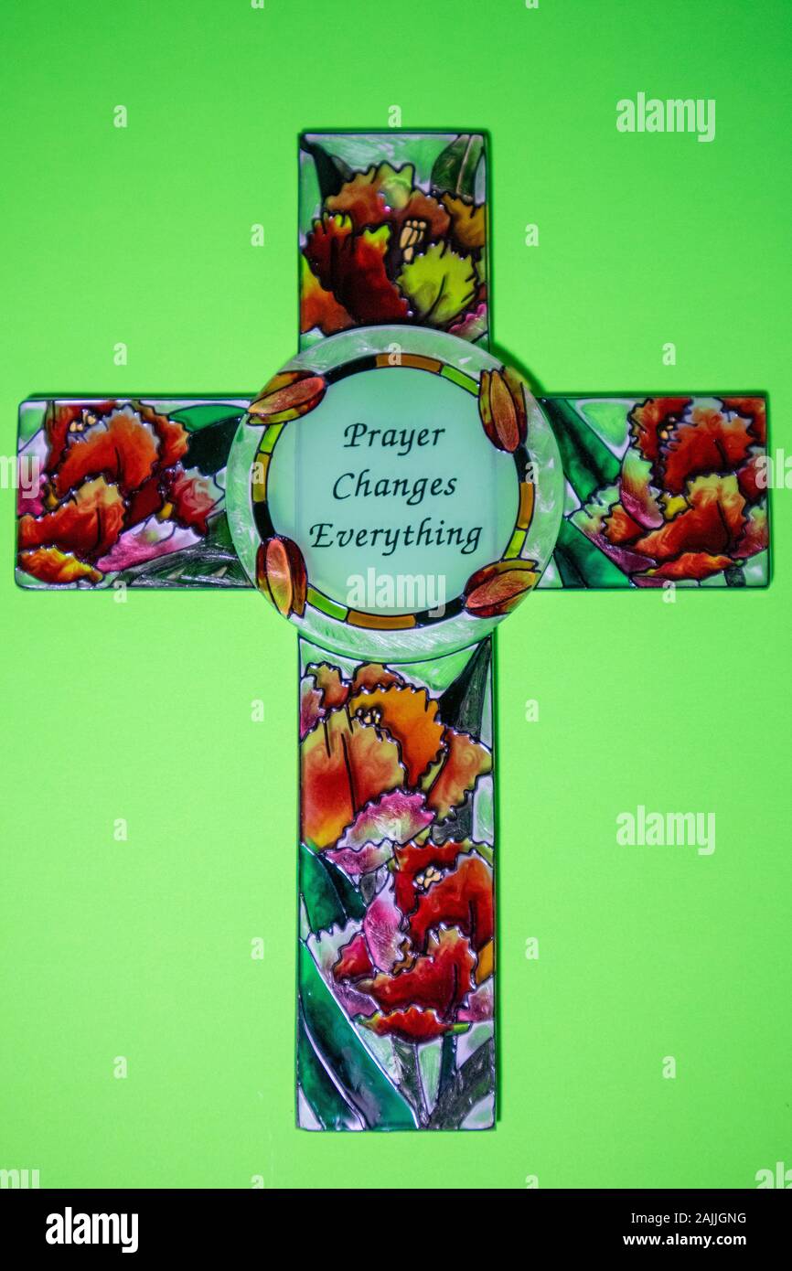 Colorful religious cross with prayer changes everything written on the ...