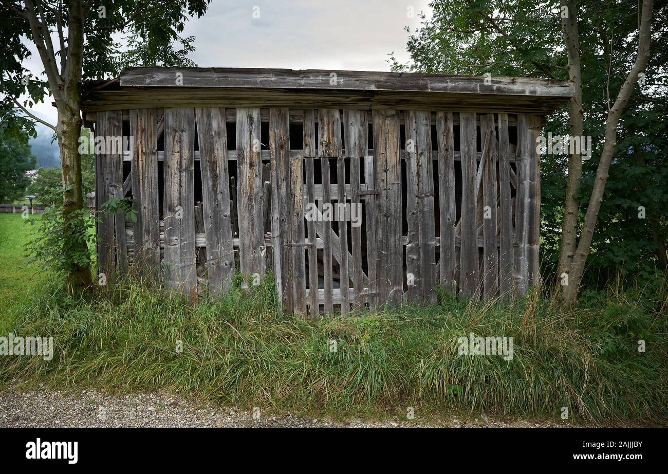 Weather beaten and run-down wooden shack in the rural countryside of ...
