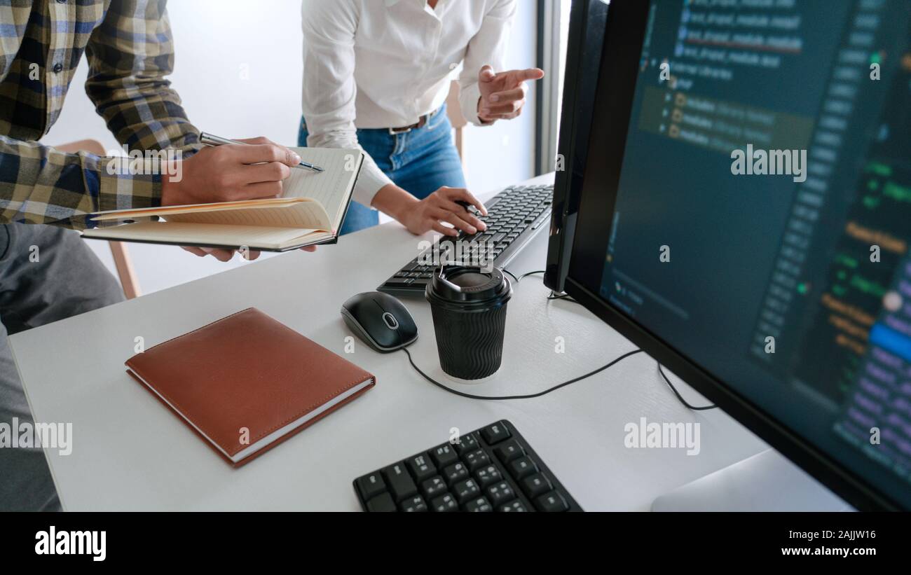 Pensive Programmer Working On Desktop Pc Programming Code Technologies Or Website Design At