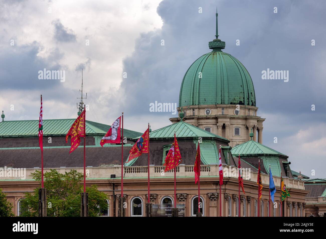 Dome historical museum Budapest with flags and overcast Stock Photo - Alamy