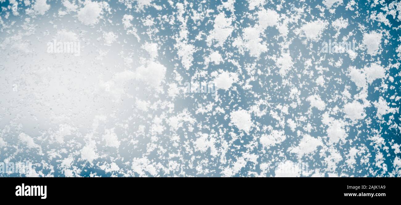 Large flakes snow on background hi-res stock photography and images - Alamy