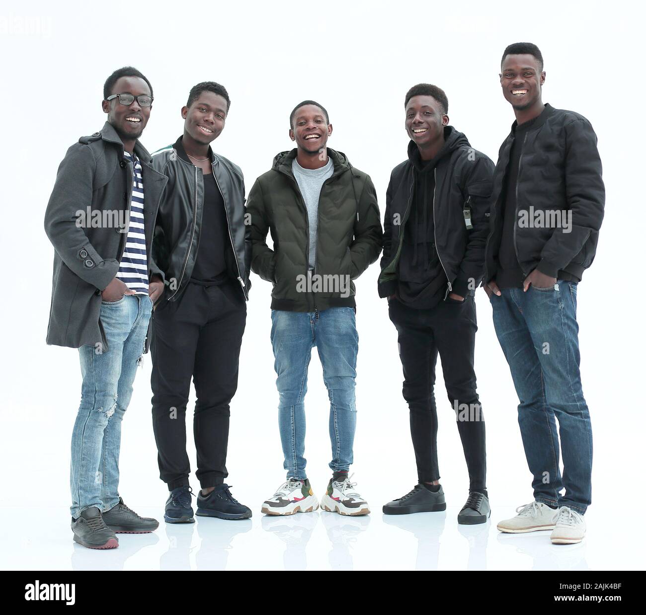 group of friendly guys standing together . isolated on white Stock ...