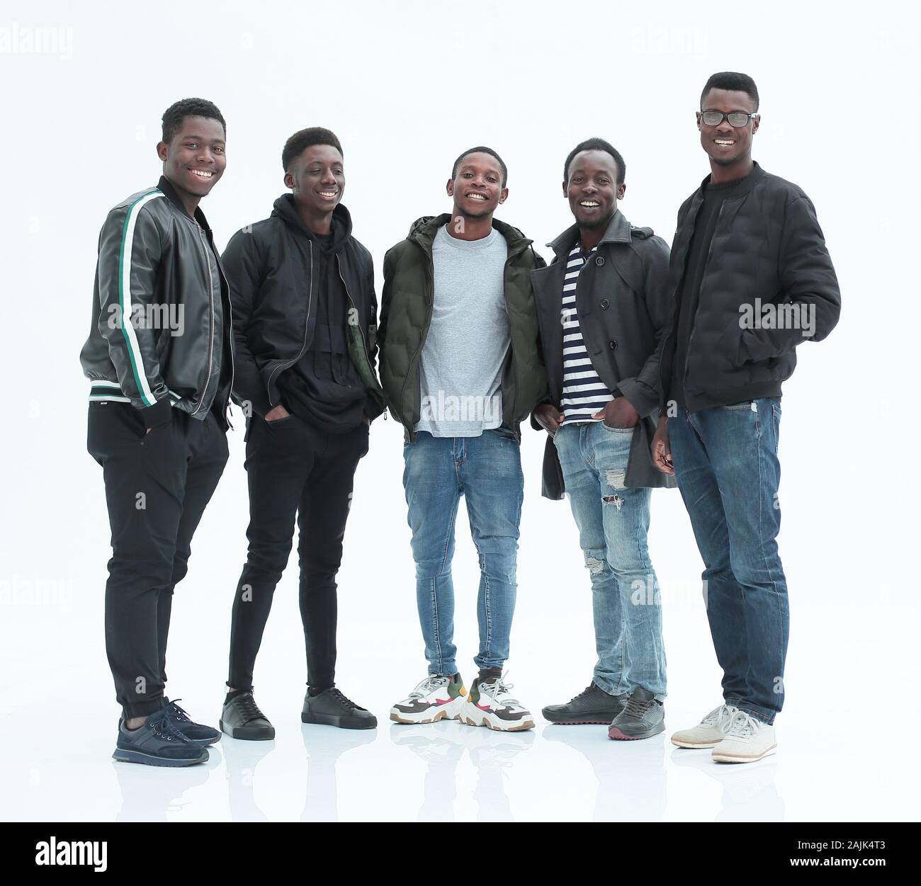 group of friendly guys standing together . isolated on white Stock ...