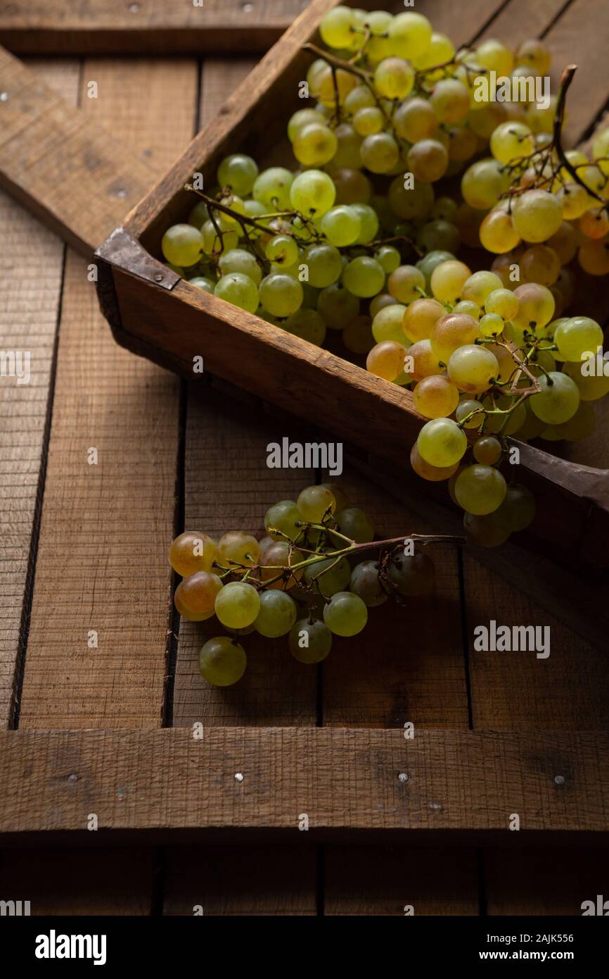 Green grapes on rustic boards Stock Photo - Alamy