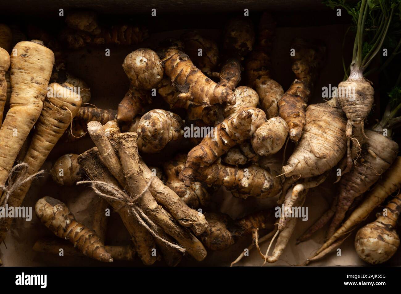 Fresh local winter roots background Stock Photo - Alamy