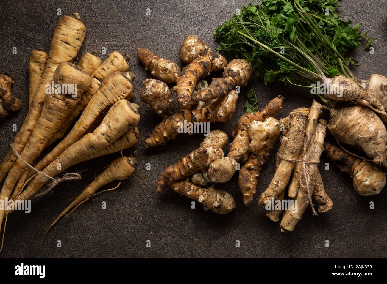 Local winter roots top view, parsnip and parsley root Stock Photo - Alamy