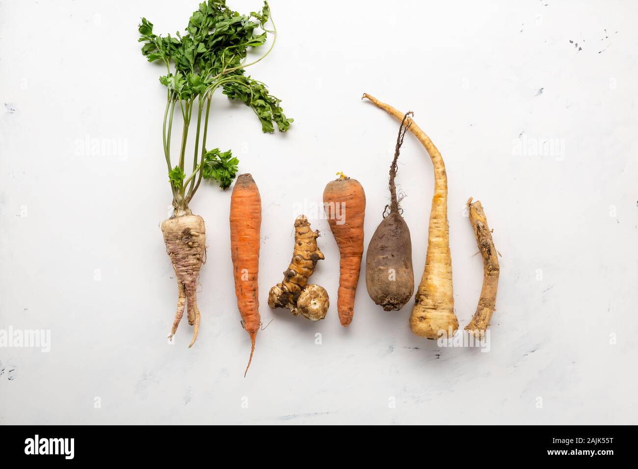 Fresh roots set on white background Stock Photo - Alamy