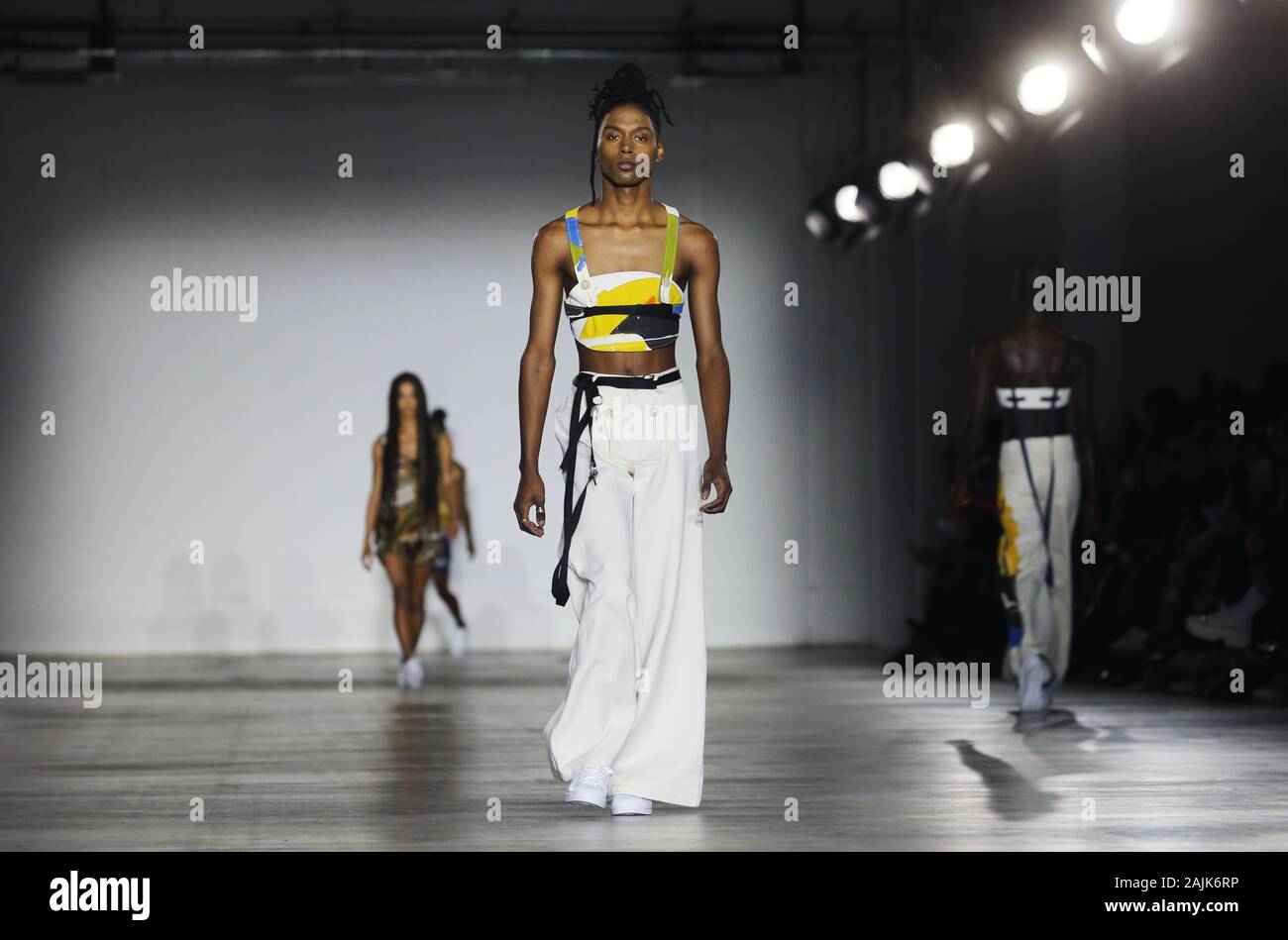 Models on the catwalk during the Bethany Williams at London Fashion ...
