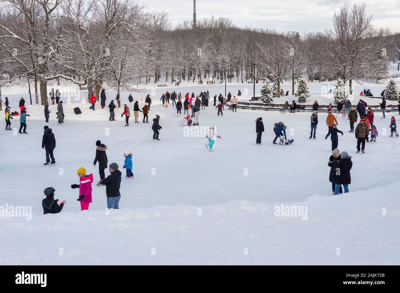 Montreal, CA - 01 January 2020: Many people ice skating at the ...