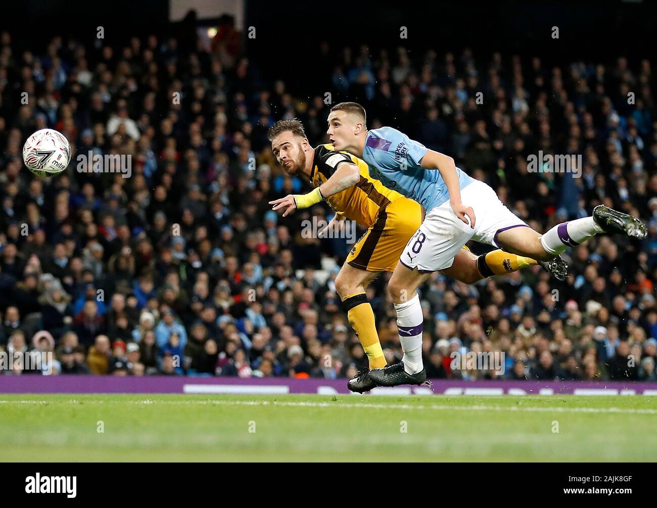 Port Vale's Tom Pope (centre) scores his side's first goal of the game ...