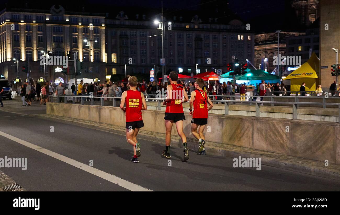 Marathon Runners at Night during Dresden summer festival Stock Photo ...