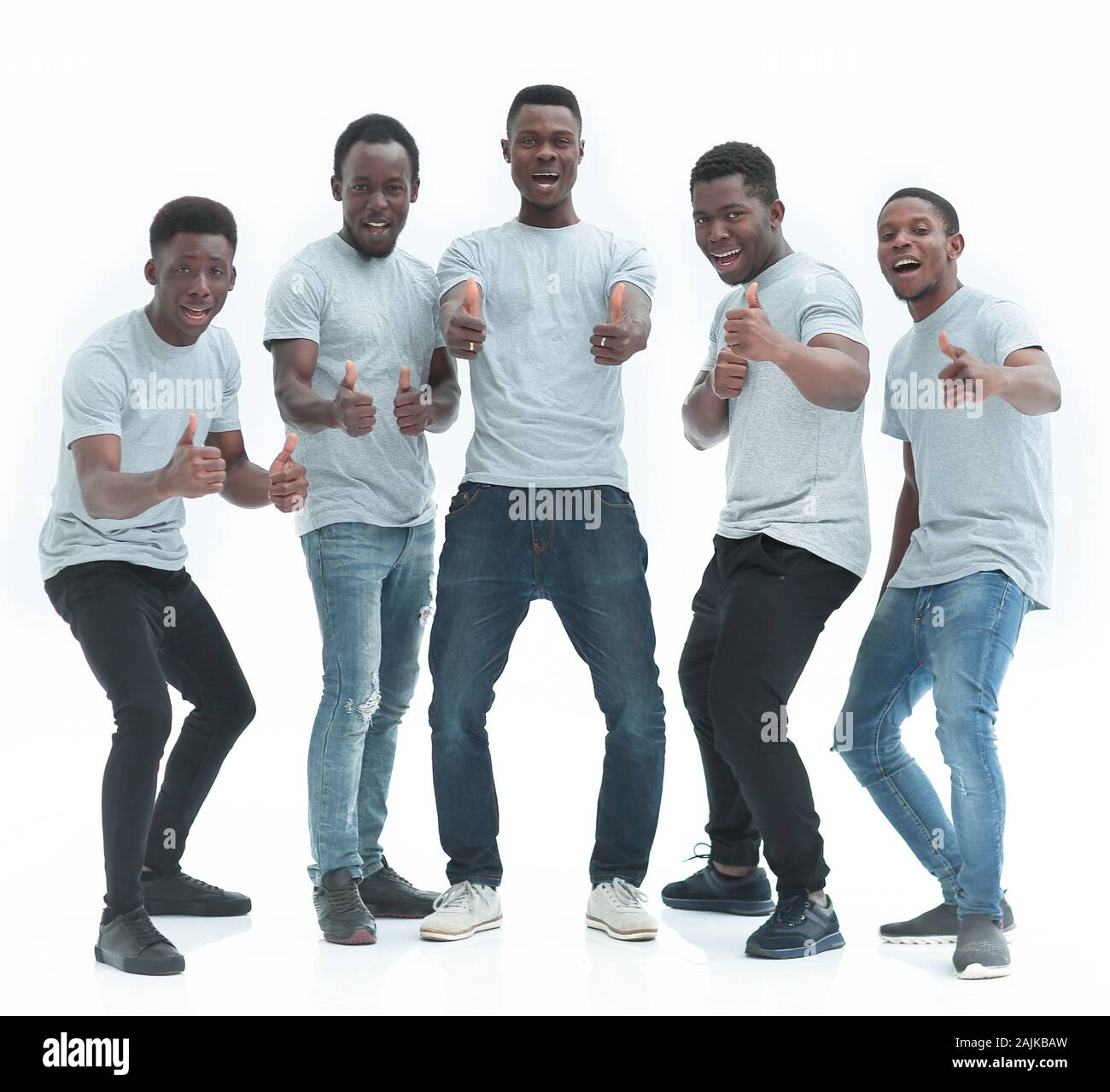 multi-ethnic group of happy guys showing thumbs up Stock Photo - Alamy