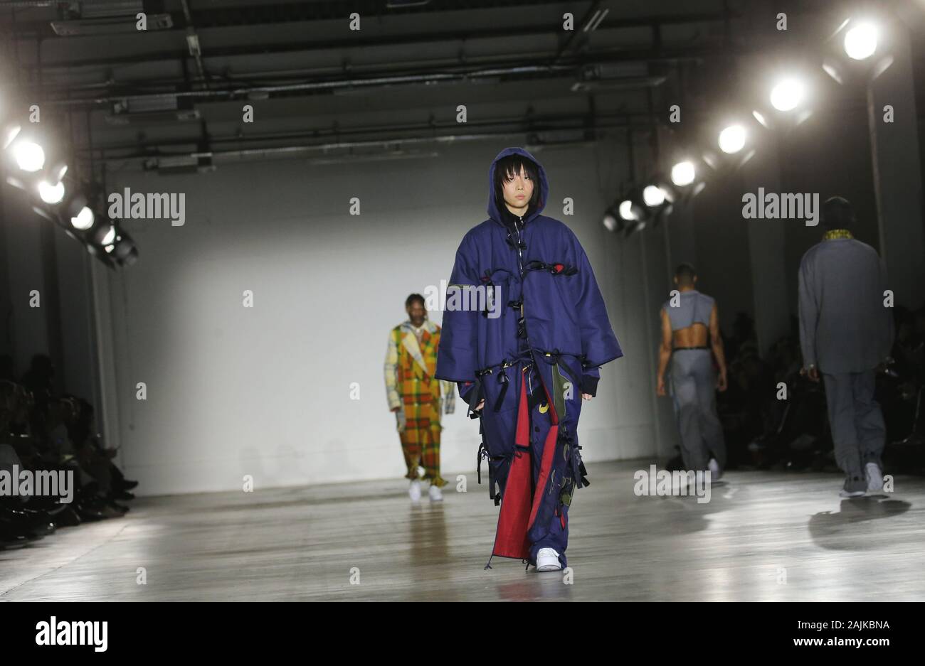 Models on the catwalk during the Bethany Williams at London Fashion ...