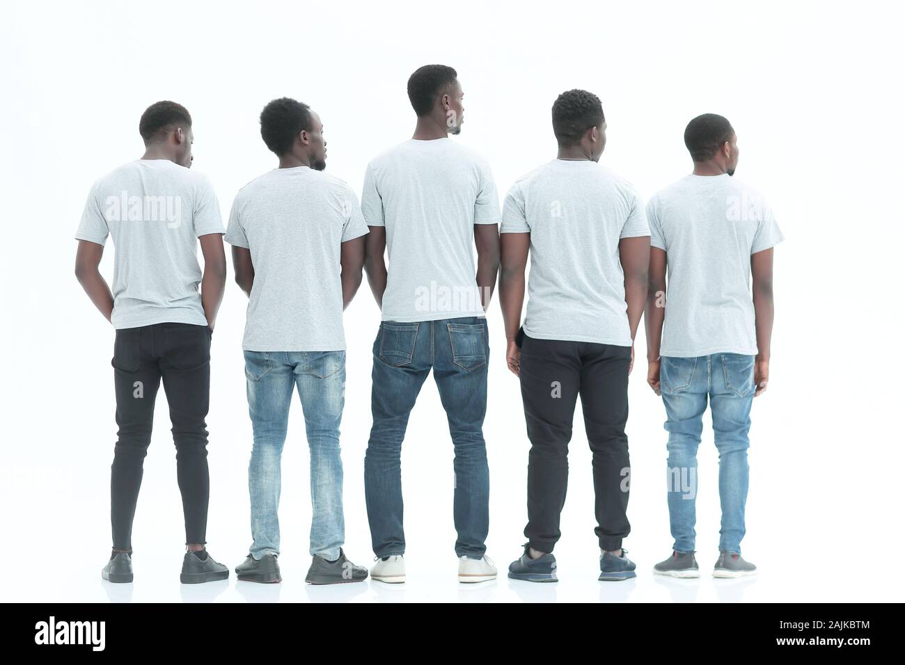rear view. group of guys looking at white blank screen Stock Photo - Alamy