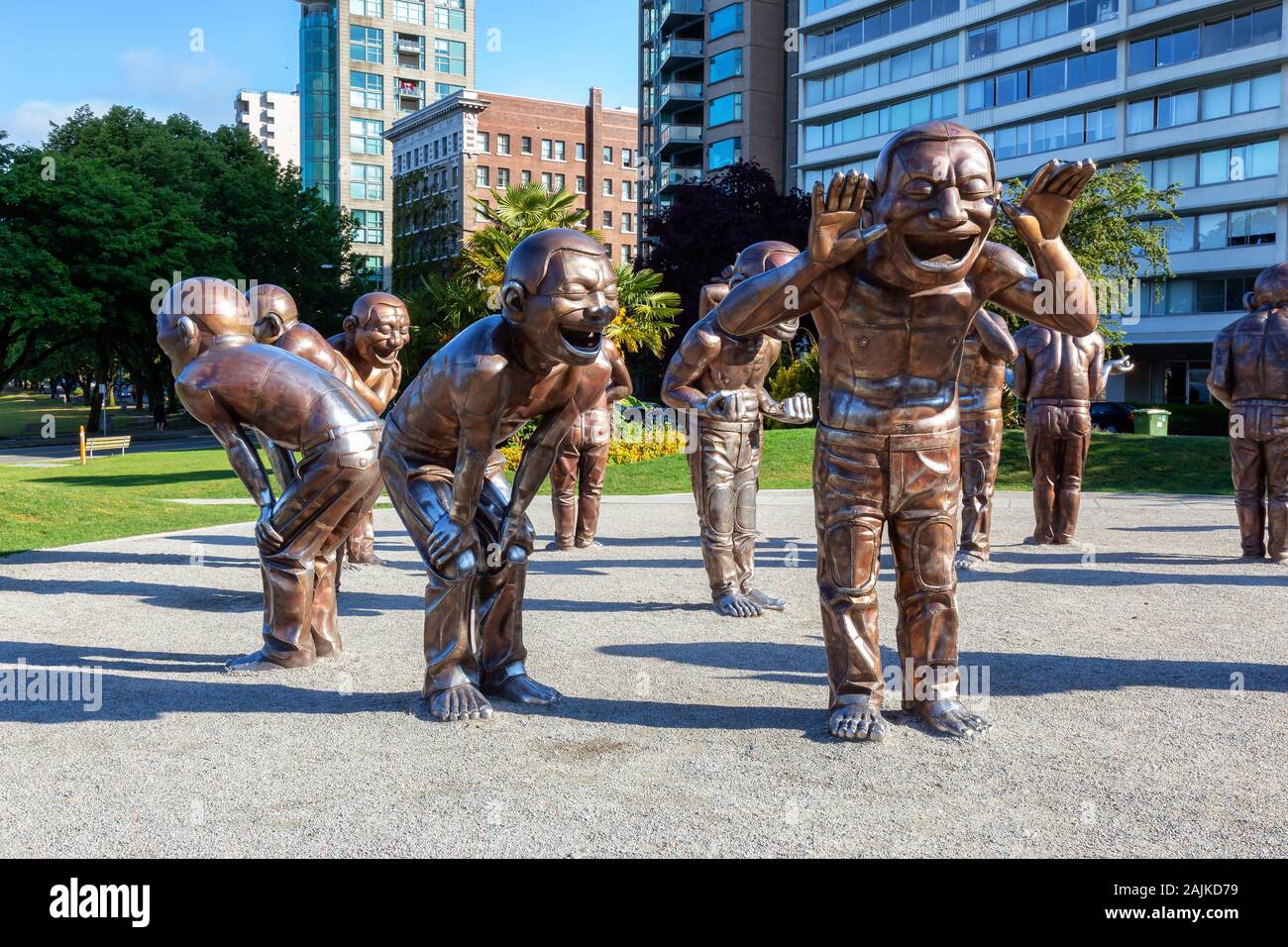 A-maze-ing Laughter Statues in the city Stock Photo - Alamy