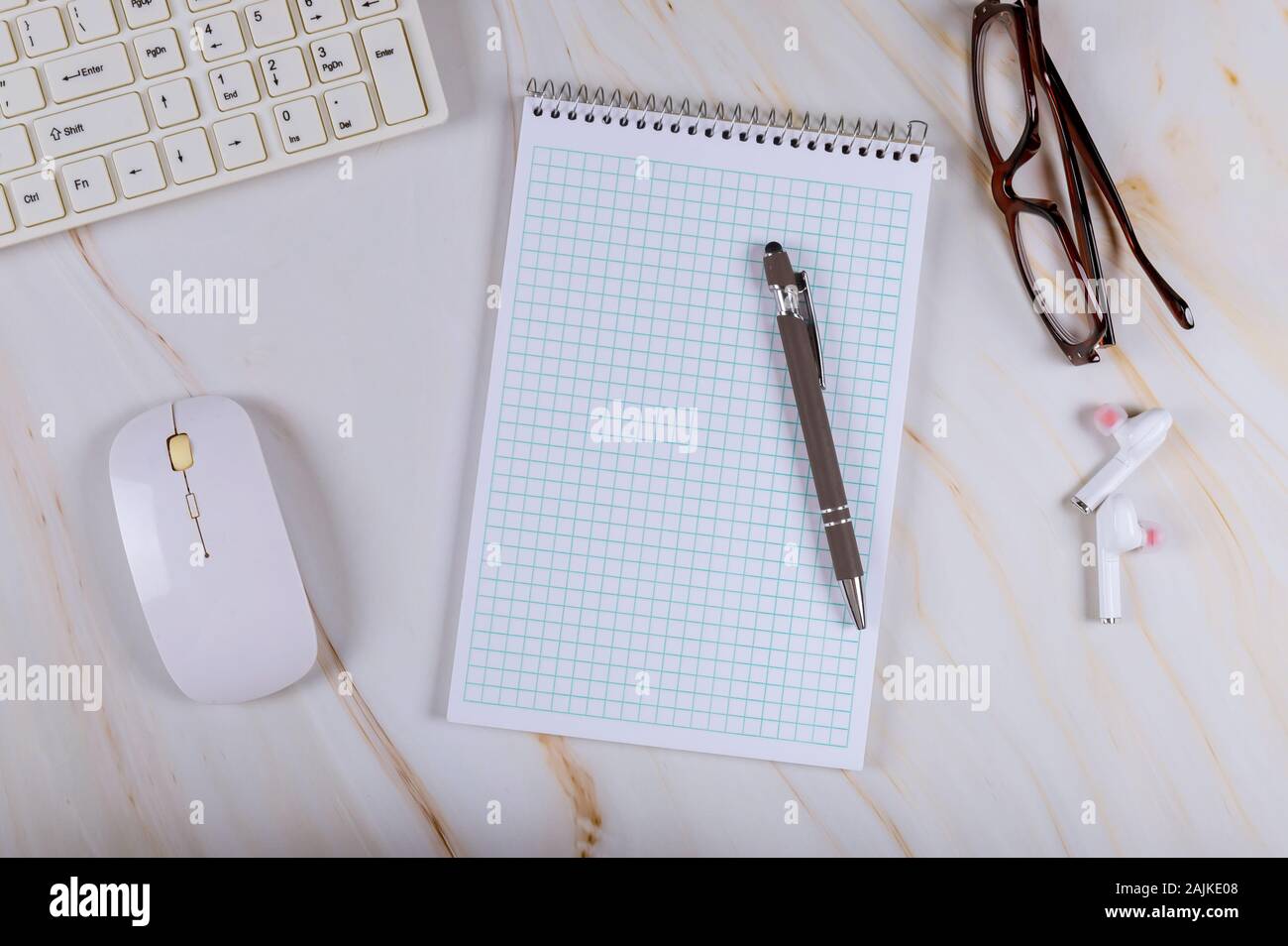 Office desk flat lay work space desk with notebook computer keyboard ...