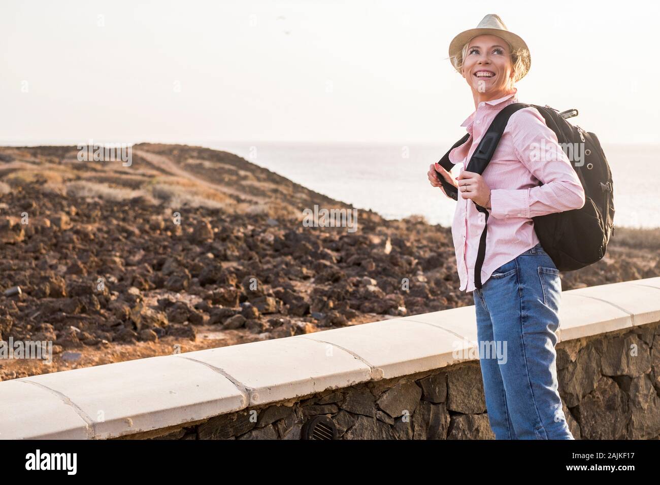 one woman ready and prepared to go trekking alone at mountains or in a ...