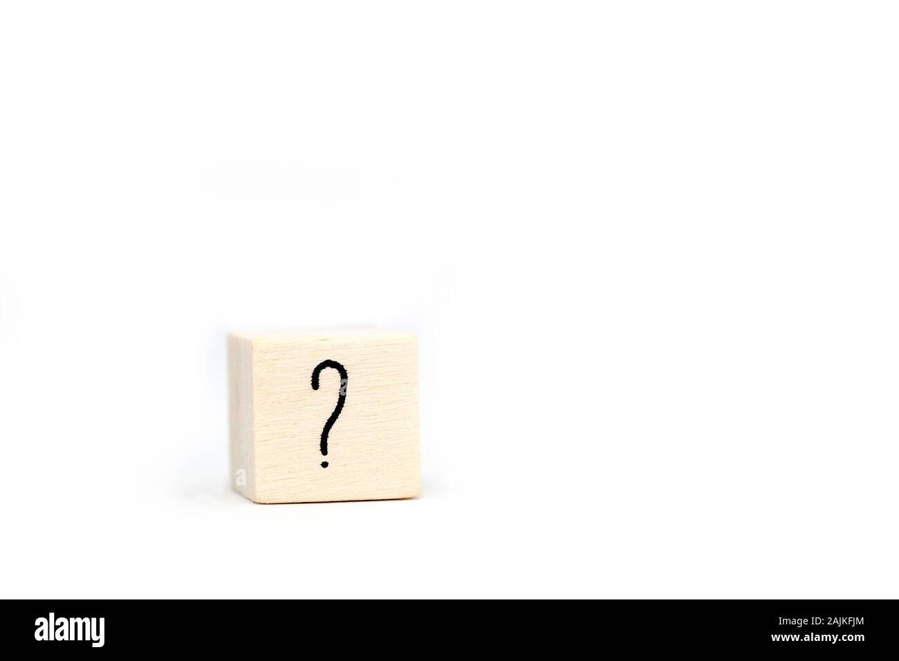 question mark on wood cube isolated on white background, symbol space ...