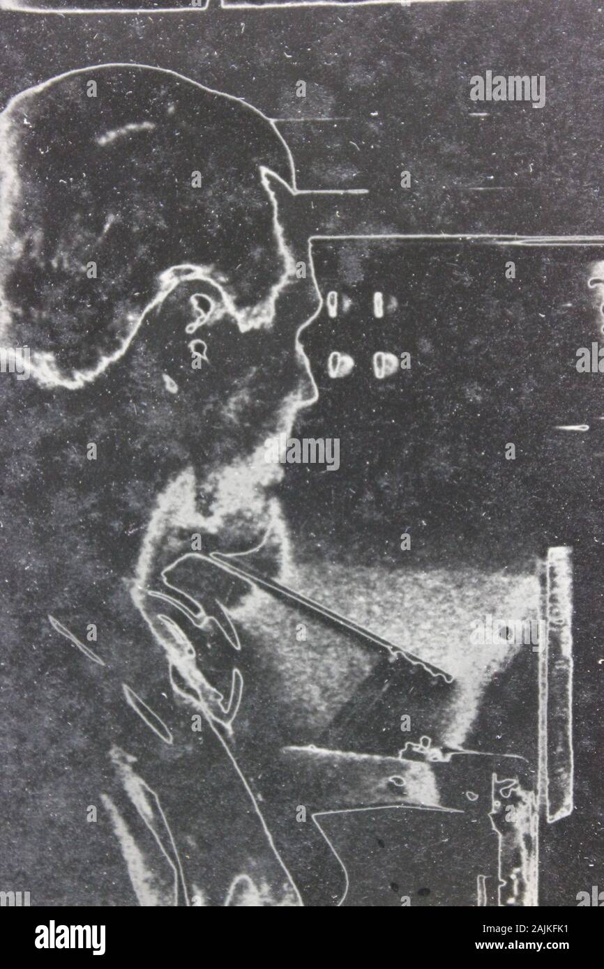 Fine 1970s black and white photography of a man reading an airport ...