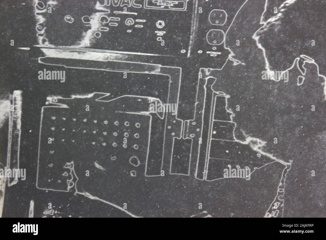 Fine 1970s black and white photography of a man reading an airport ...