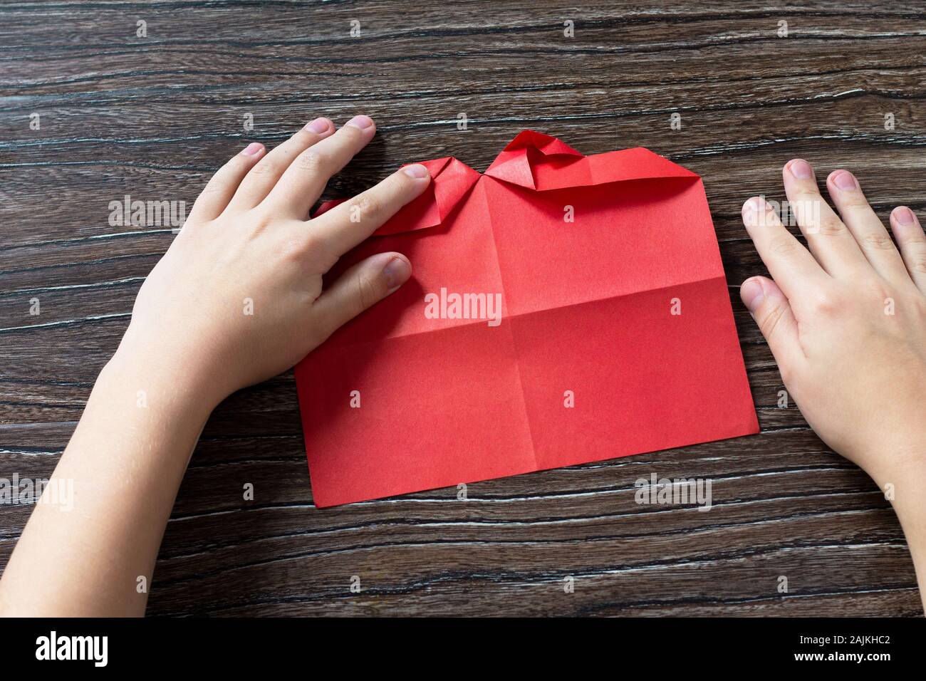 Step 12 origami. Greeting card with valentine heart congratulation ...