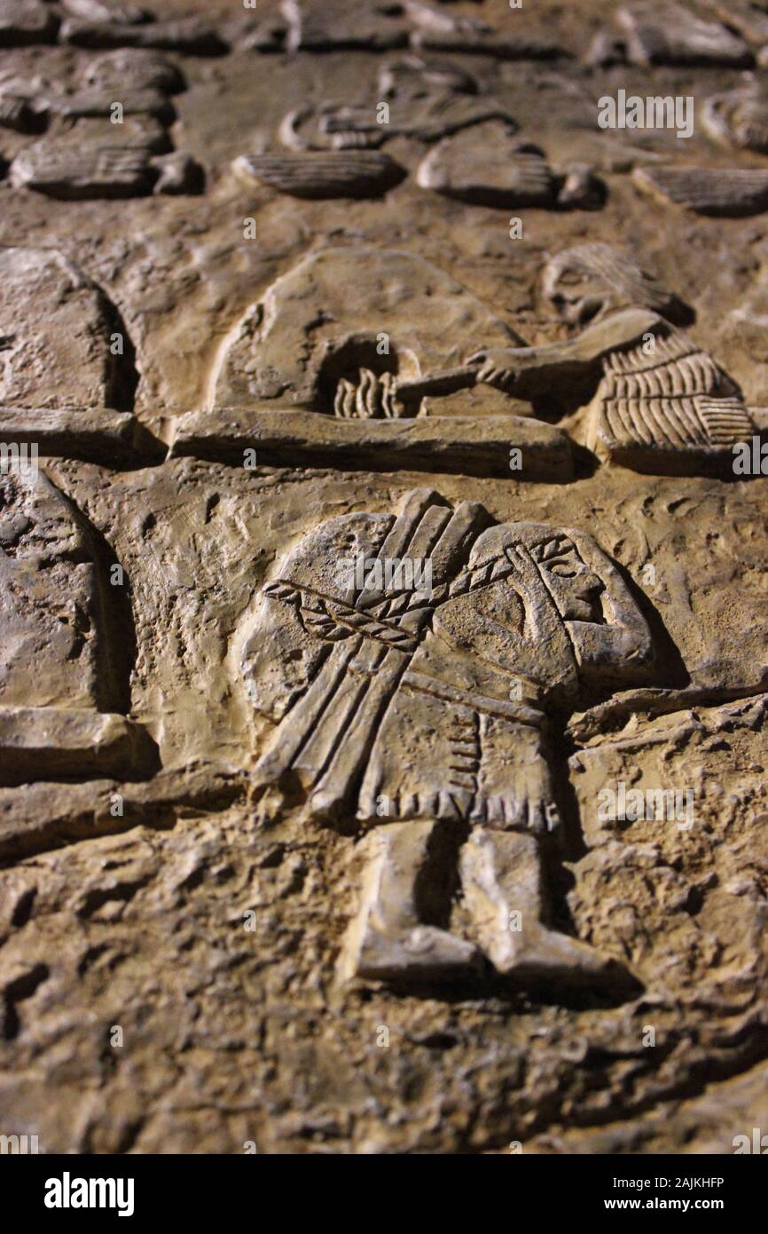 Ancient Sumerian pictographs etched into a wall at the Milwaukee Public ...