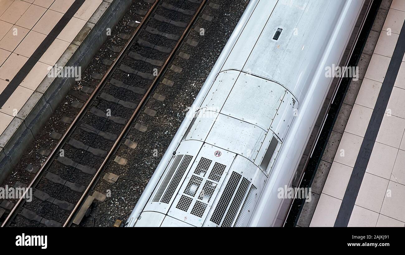 Abstract shot of a Inter City Express Train or ICE train and side track ...