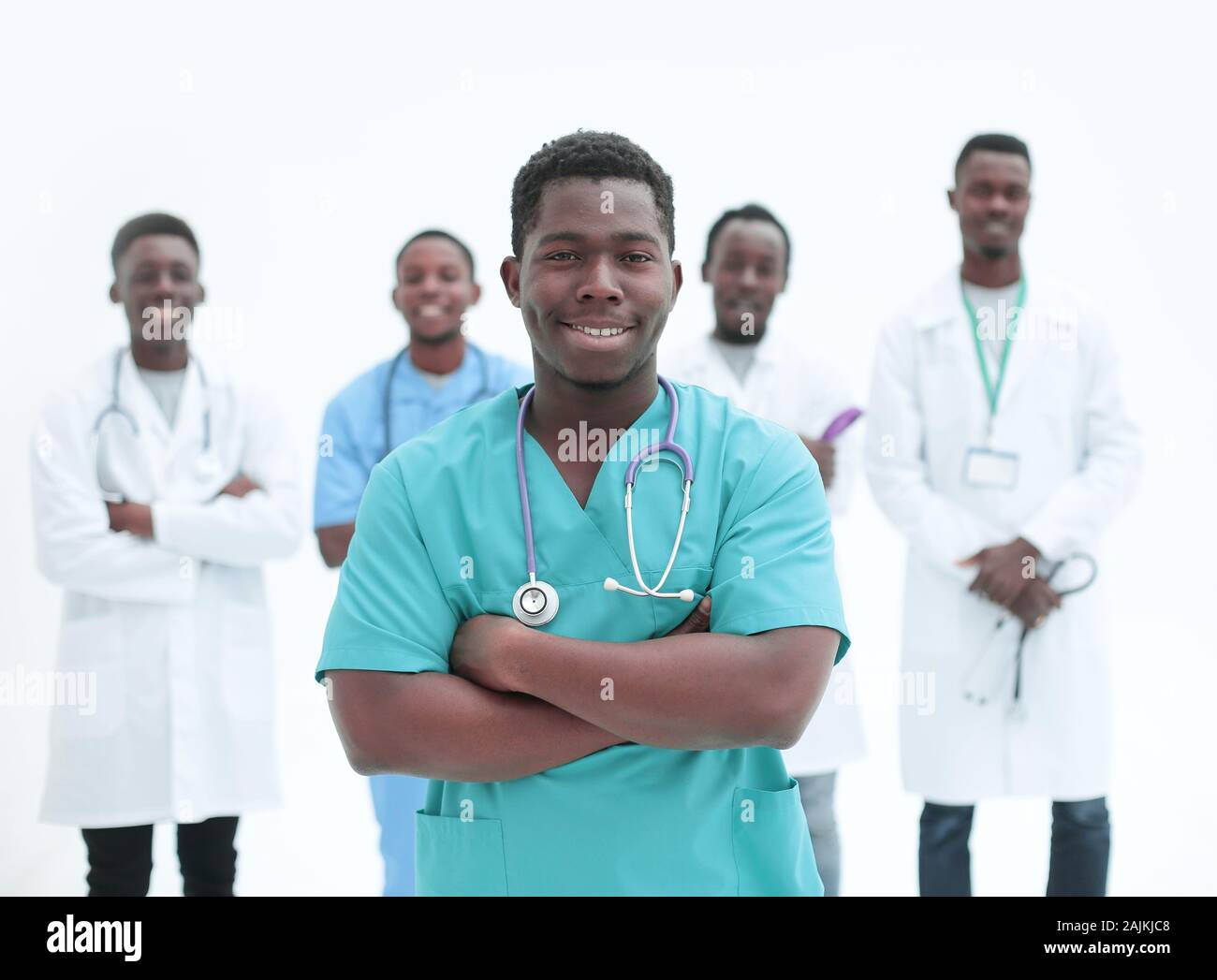 smiling surgeon standing in front of his colleagues Stock Photo - Alamy