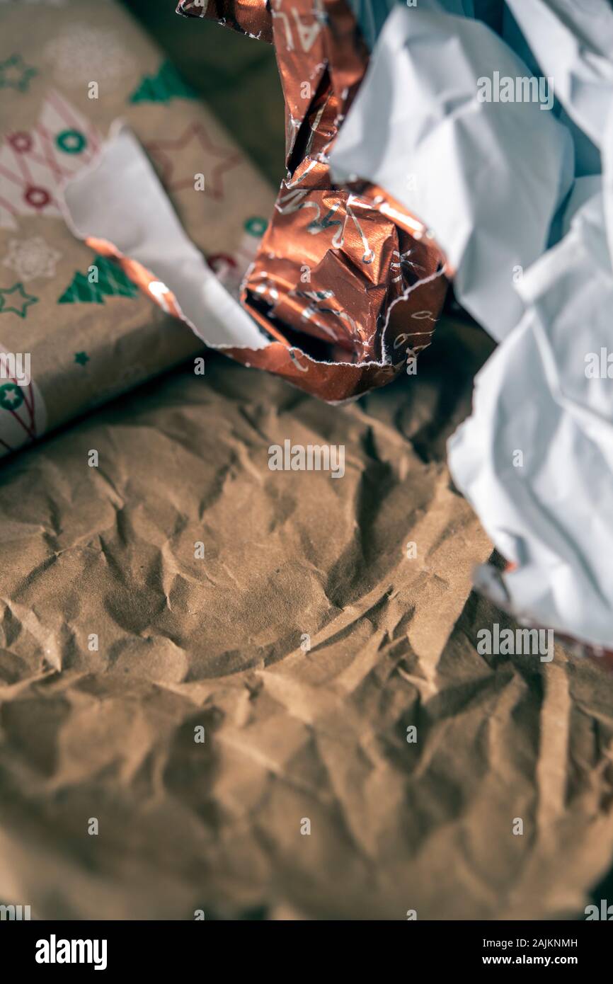 Discarded wrapping paper from opened Christmas presents Stock Photo - Alamy