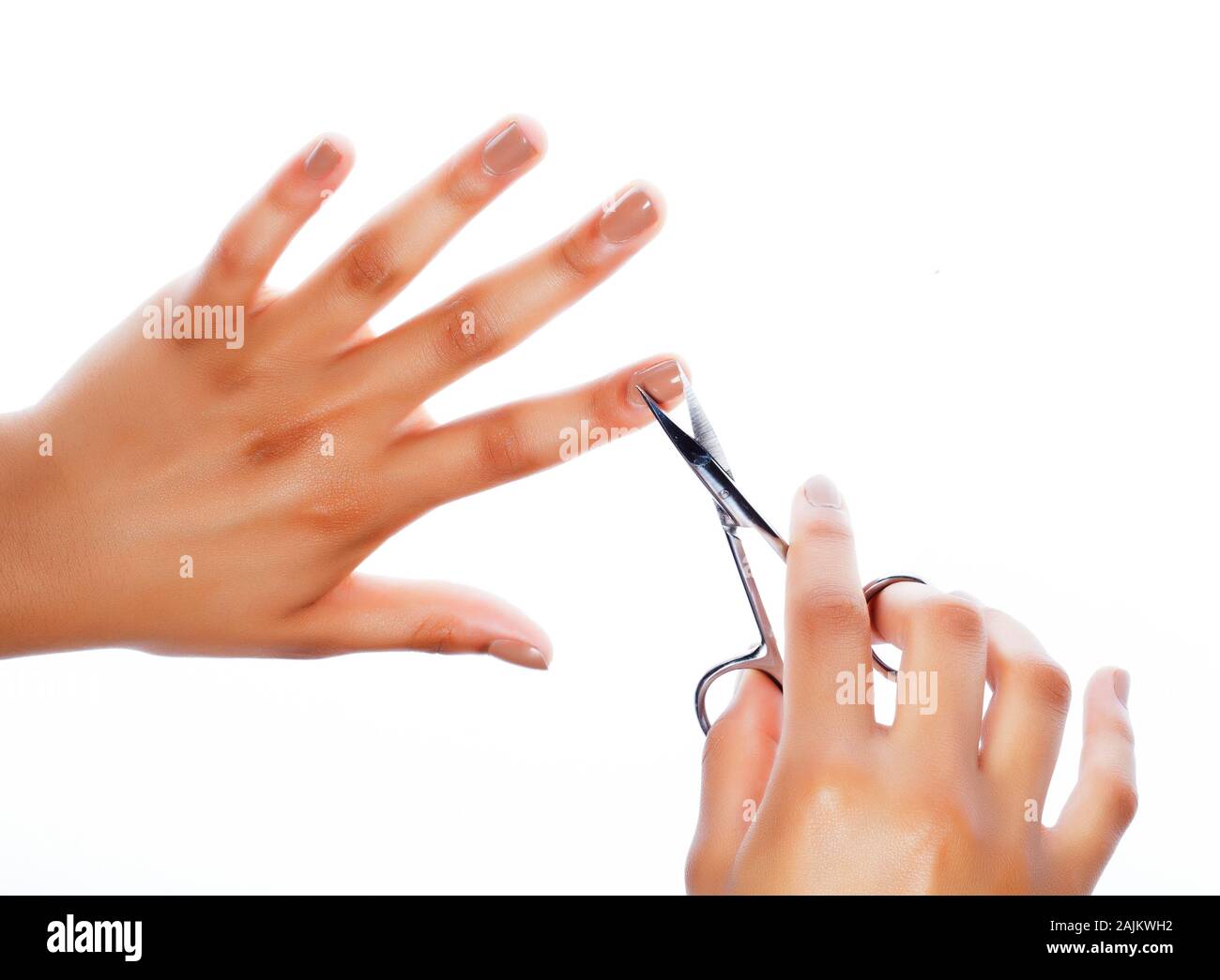 african taned hand doing manicure pedicure by itself isolated on white ...