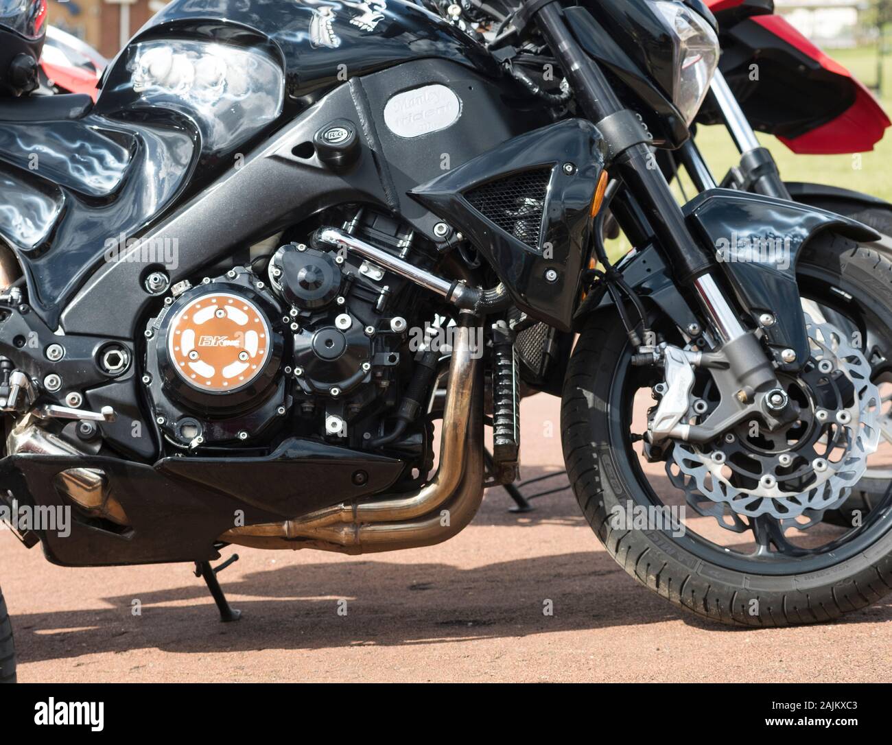 Big motorcycle engine and wheel side view Stock Photo - Alamy