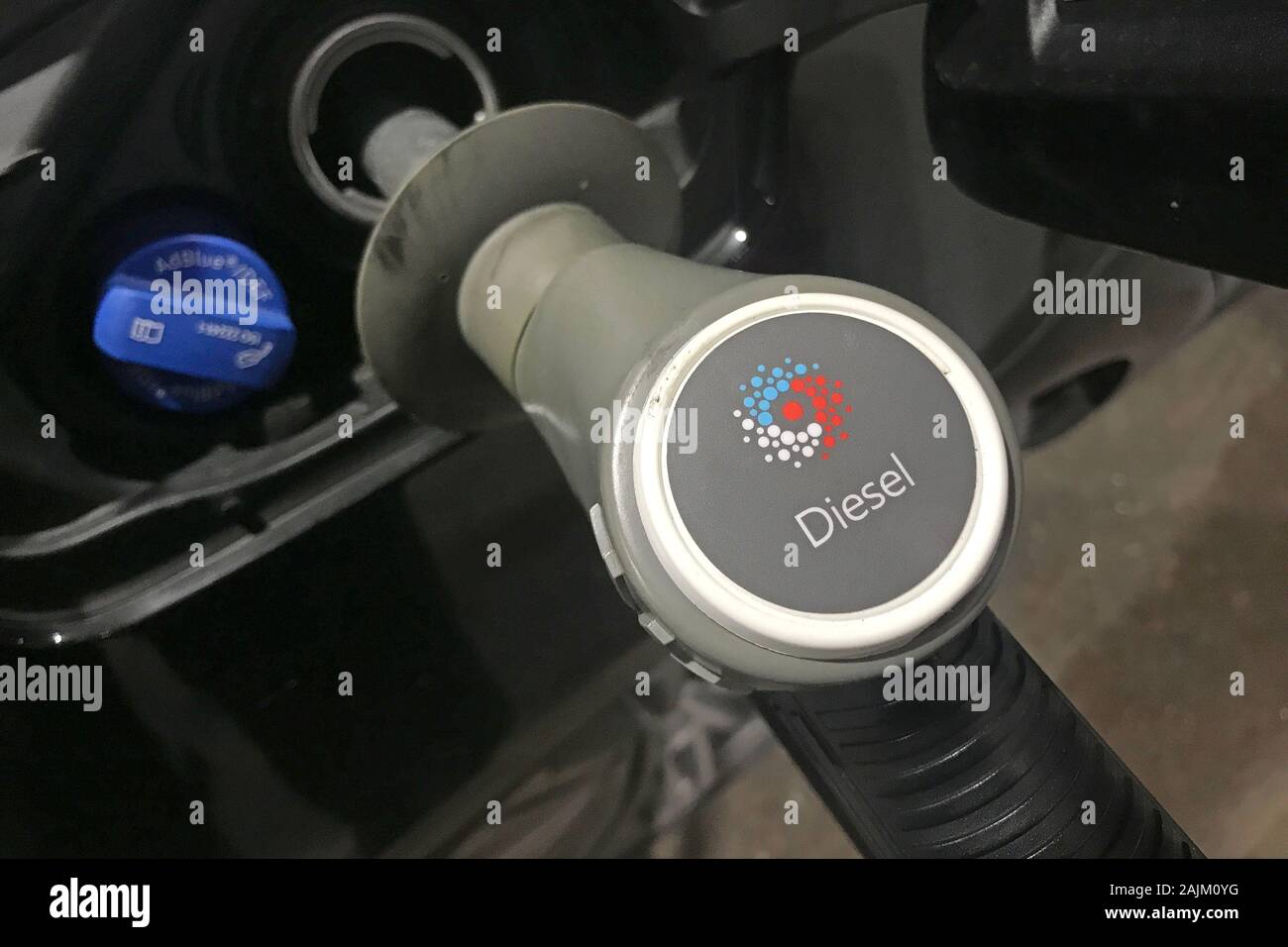 Refueling a car with diesel fuel, diesel, fuel, internal combustion ...
