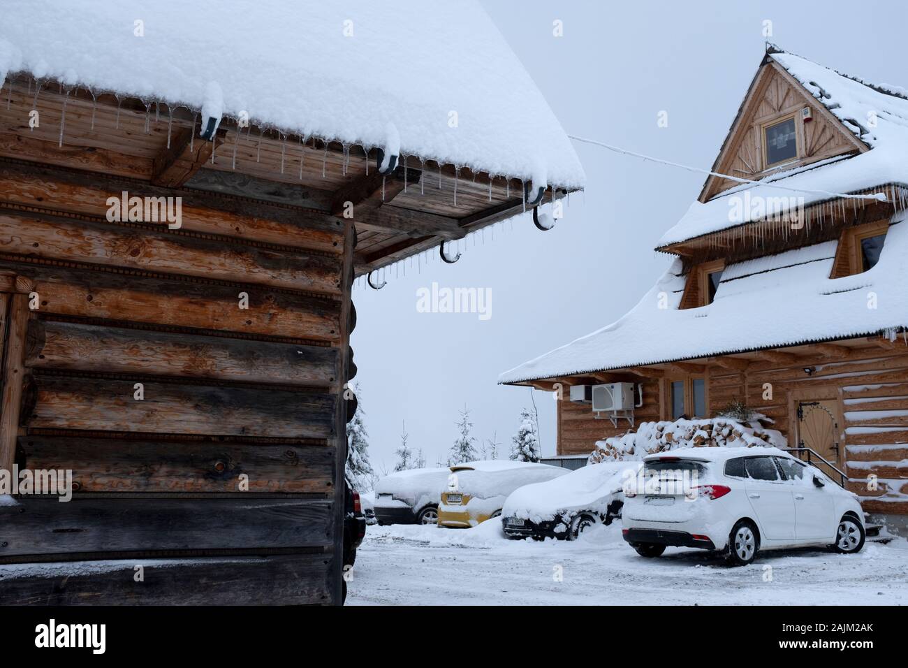 Snow covered Traditional polish houses, zakopane, poland Stock Photo ...