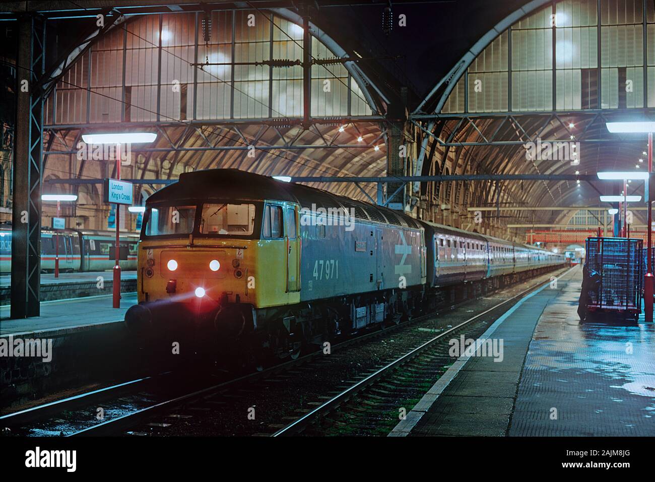 A class 47 diesel locomotive number 47971 waits to depart London Kings ...