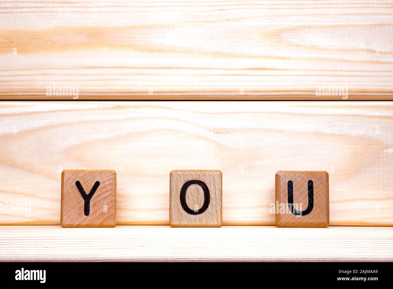 You word made of wood background. You sign. Word You constructed with ...