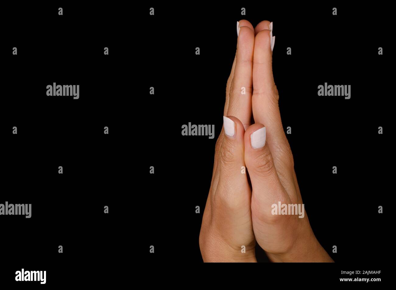 Female hands in praying gesture Stock Photo - Alamy