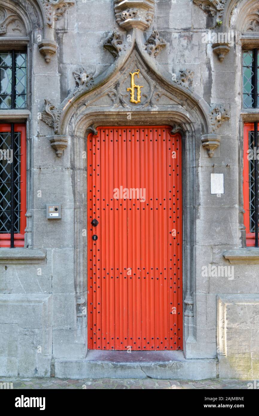 figures on the walls of the Basilica of the holy blood and the Red Door ...