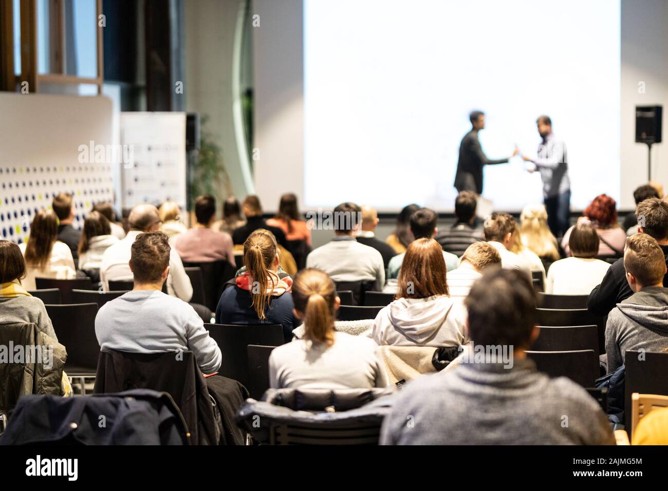 Business speakers giving a talk at business conference event Stock ...