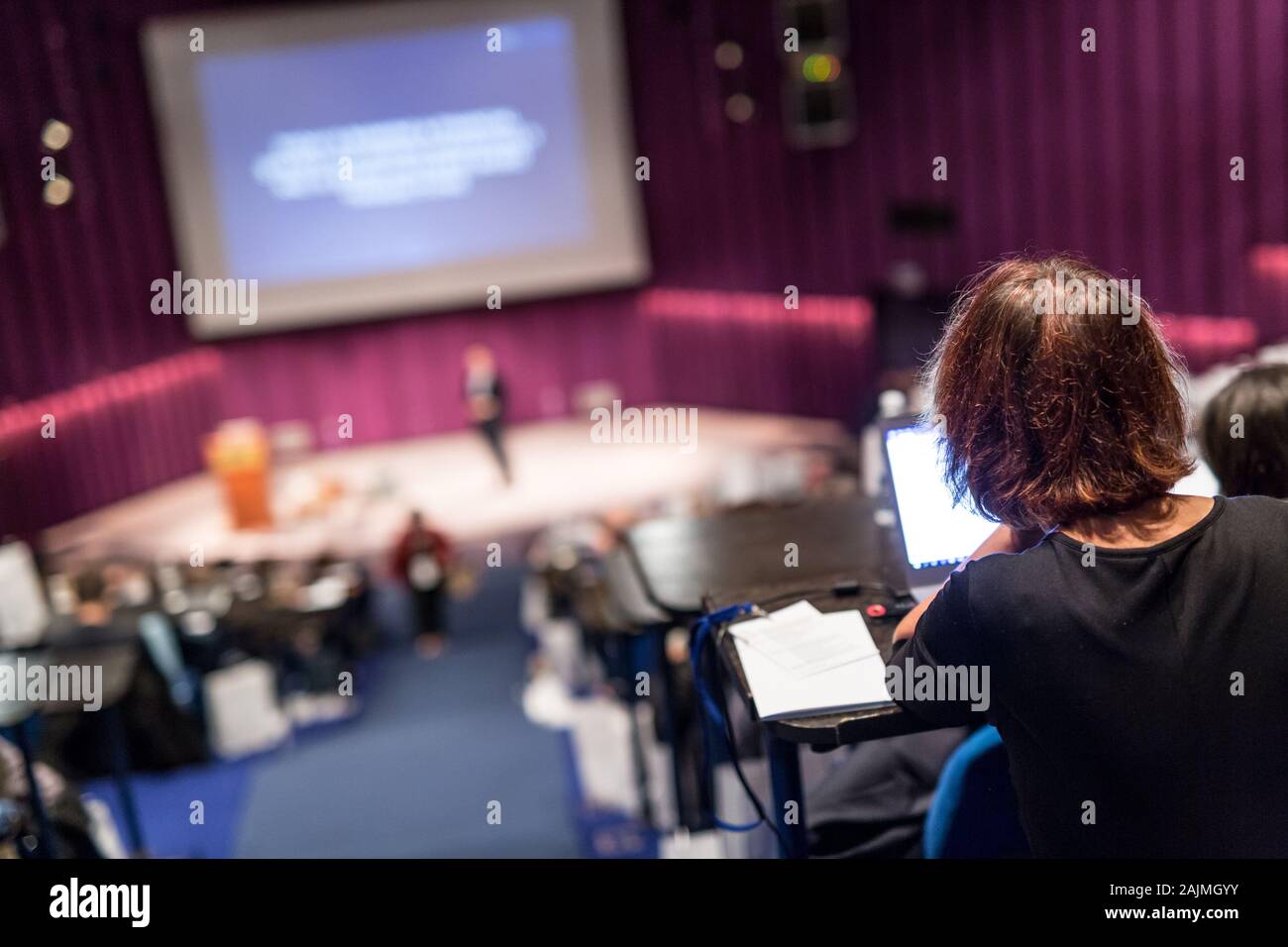 Audience in the lecture hall attending business conference event Stock ...