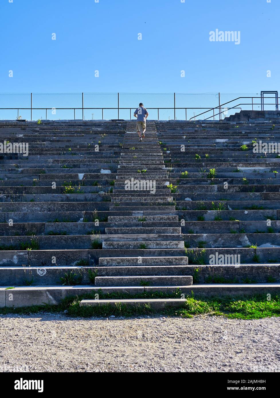 Solitary man trains by running up a long set of steps at the infamous ...