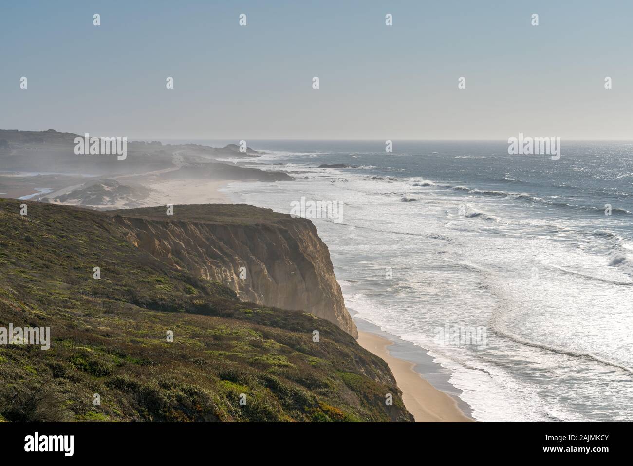 Wide Angle Aerial View of Green Grass Cliff Over the PAcific West Coast ...